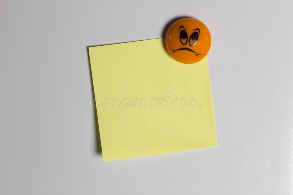 Yellow Sticker on the Fridge with a Sad Face Fridge Stock Photo - Image ...