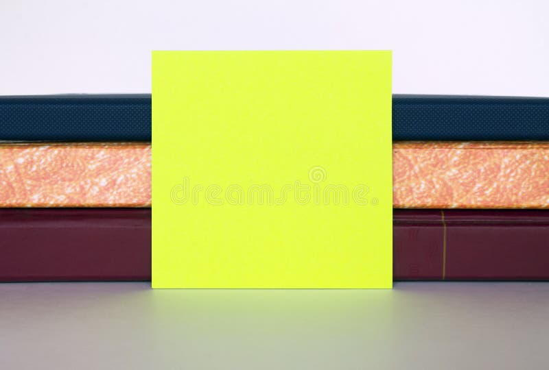 Yellow Sticker Question Mark on a Stack of Notebooks Stock Image ...