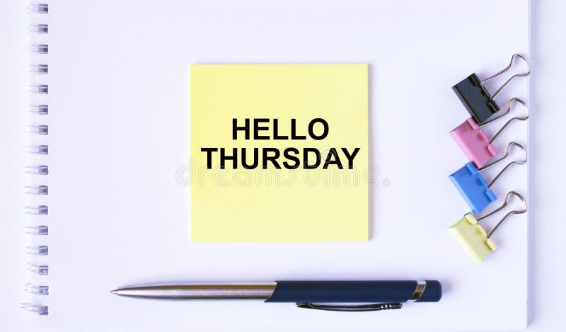 Yellow Sticker with Text Hello Thursday Lying on a White Notepad with a ...