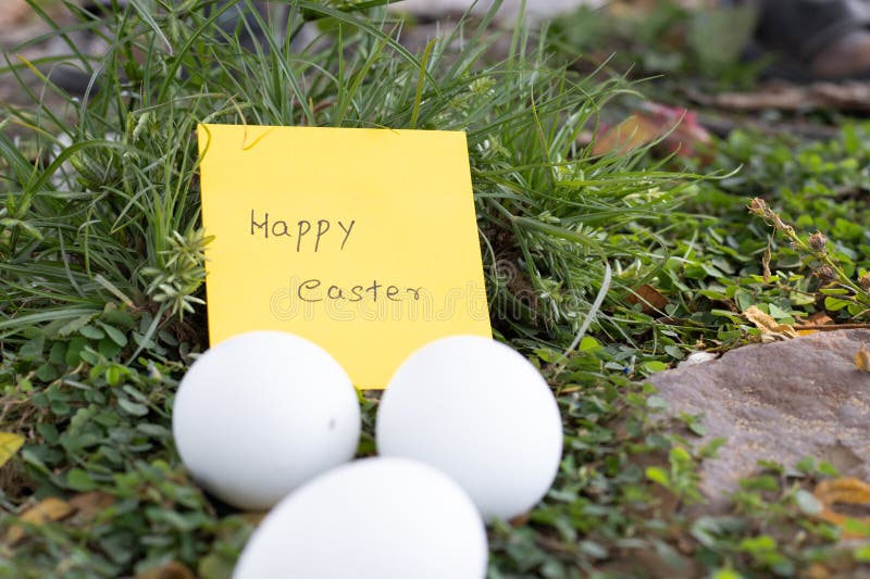 Happy Easter Words Written in Yellow Sticky Note and 3 White Eggs ...