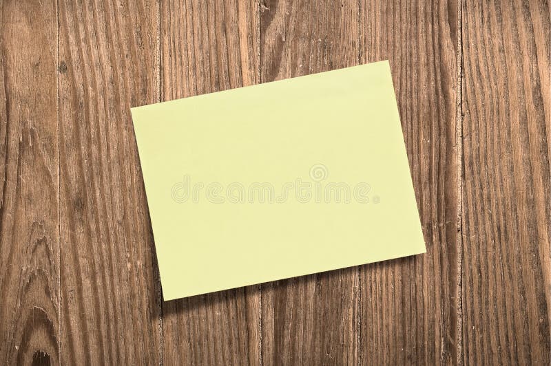 Yellow Sticky Note on Wooden Board. Stock Photo - Image of message ...