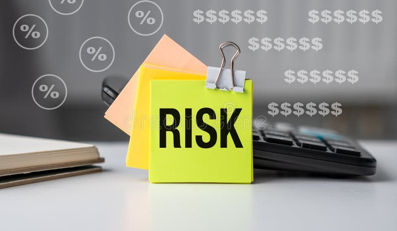 A Yellow Sticky Note with the Word RISK Written on it is Sitting on Top ...