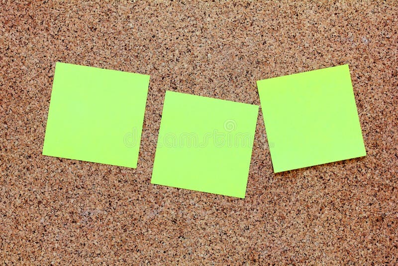 Yellow Sticky Notes on a Cork Board Stock Photo - Image of isolated ...