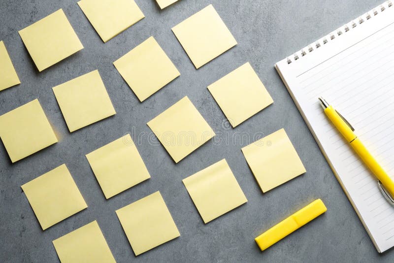 Yellow Sticky Notes on Grey Paper Background. Empty Room for Text. Top ...