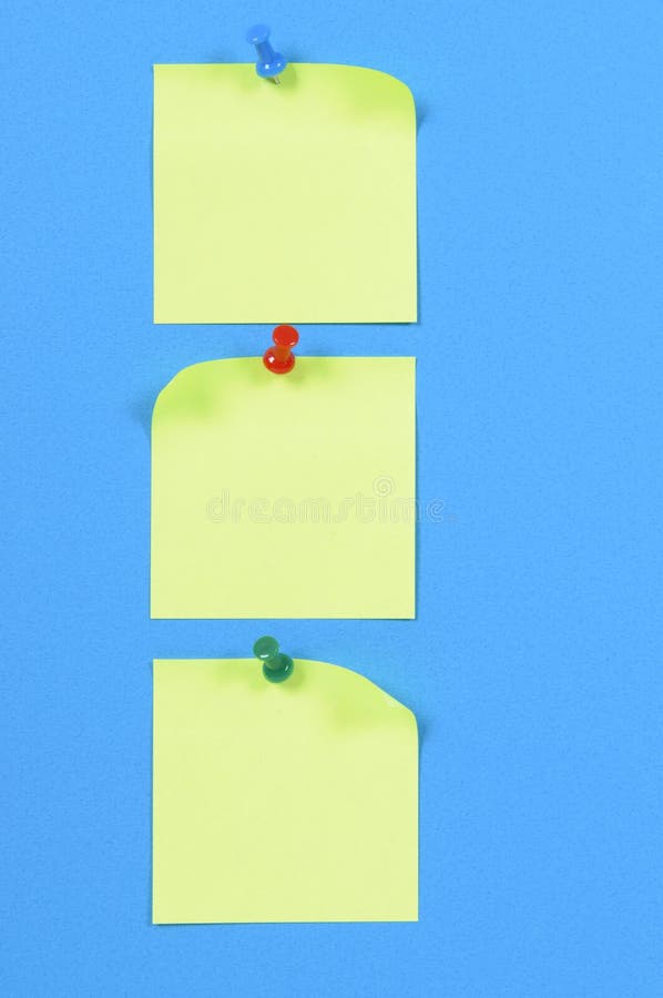Row of Post-it Style Yellow Sticky Notes Pinned To Blue Background ...