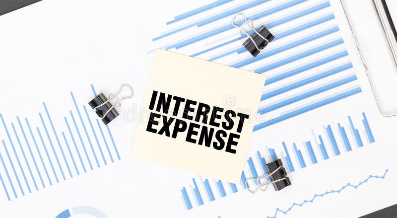 Yellow Sticky Notes with Text Interest Expense on the White Office Desk ...