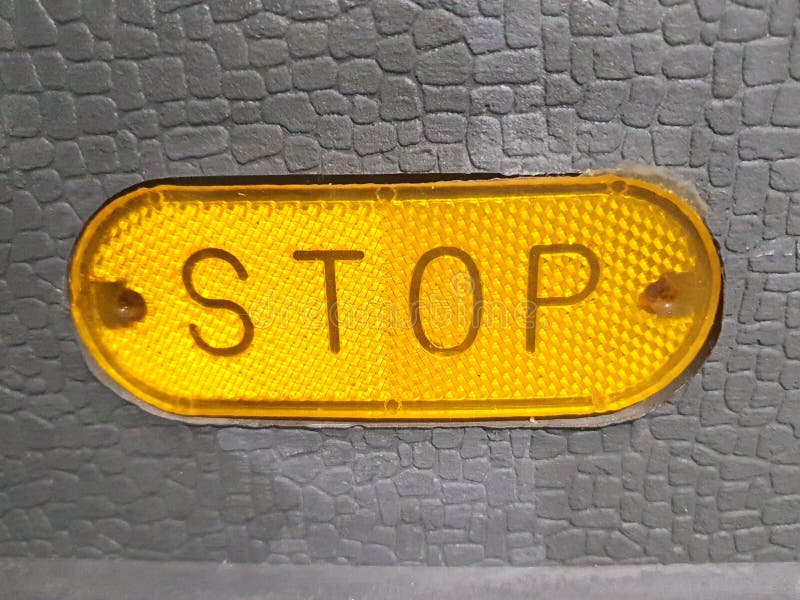 A Yellow Stop Sign on Black Texture Background Stock Image - Image of ...