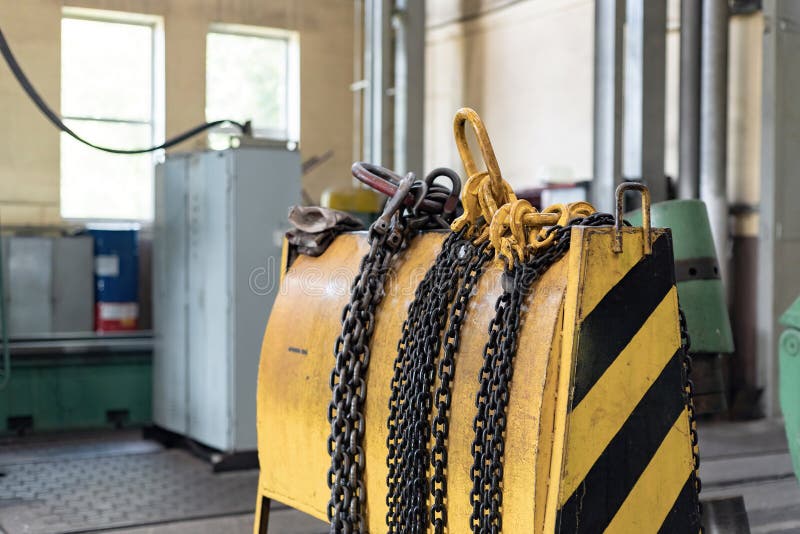 Yellow Storage Rack for Chain Slings for Lifting Loads on a Crane Stock ...