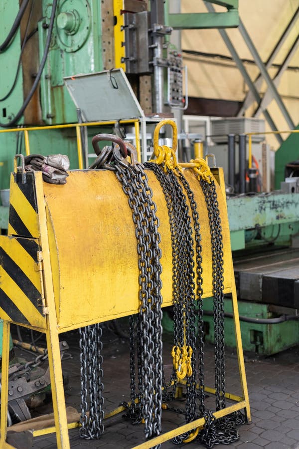 Yellow Storage Rack for Chain Slings for Lifting Loads on a Crane Stock ...
