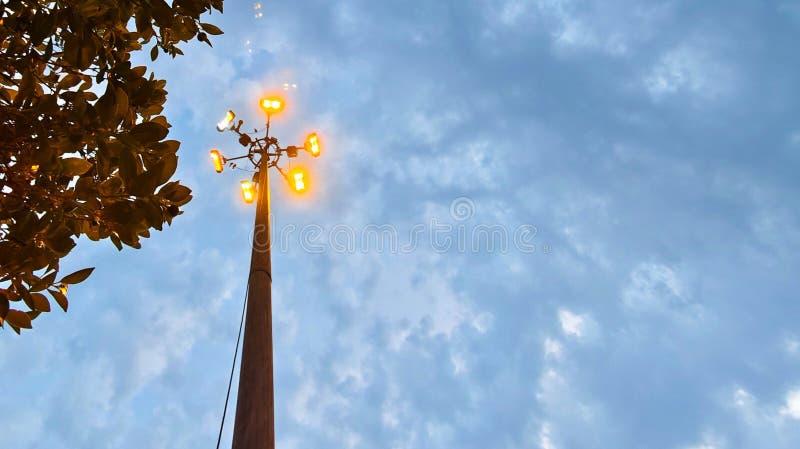 Yellow Street Light Covered with Clouds Stock Image - Image of wind ...