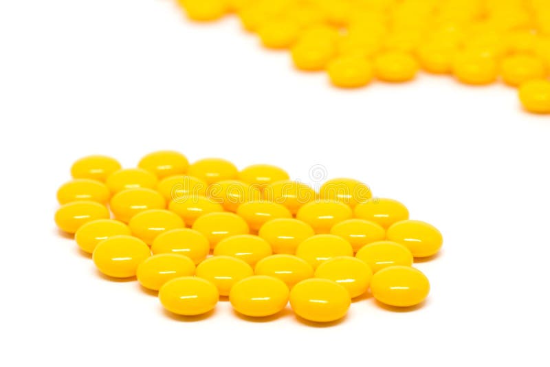 Yellow Sugar Coated Tablets Pills Stock Photo - Image of closeup ...