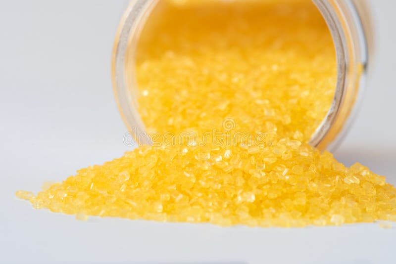 Yellow Sugar Crystals Spilled from a Jar Stock Photo - Image of view ...