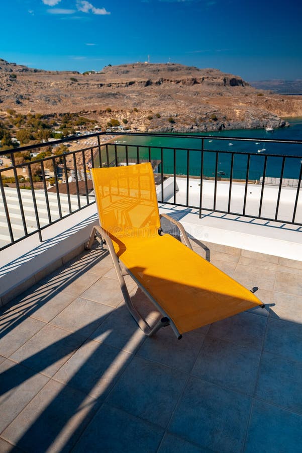 Yellow Sun Lounger on the Balcony Stock Photo - Image of tropical ...