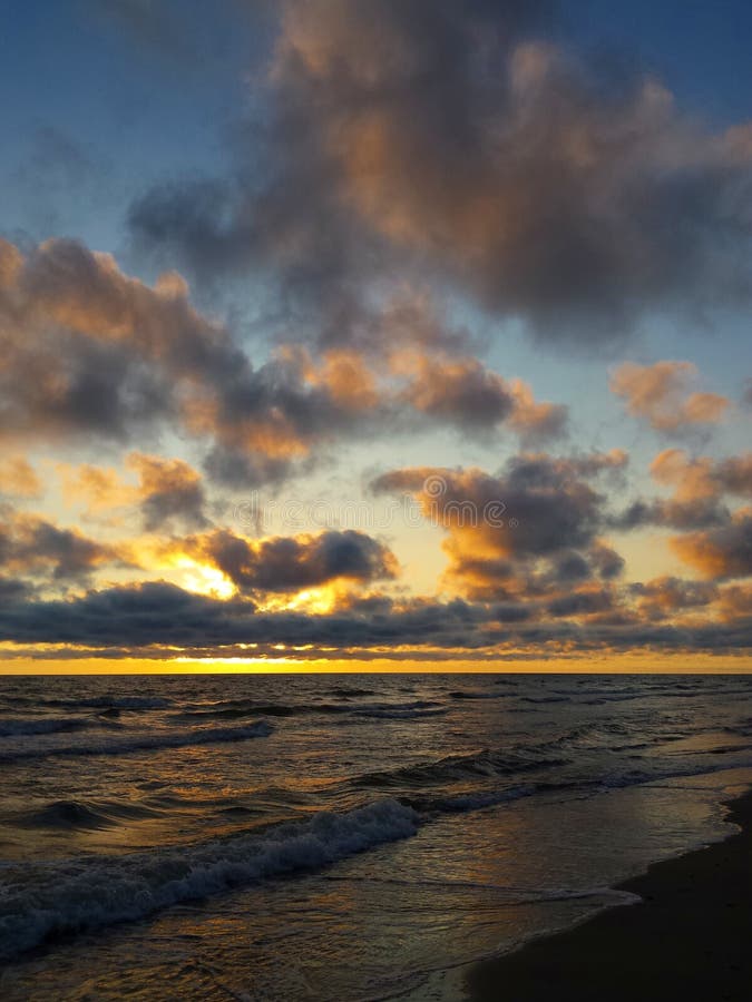 Yellow sunset stock photo. Image of eclipse, dense, cloud - 74461170