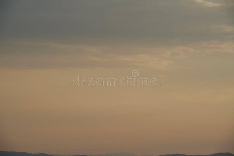 Pastel Yellow Sunset Sky Over Mountains Landscape Stock Photo - Image ...