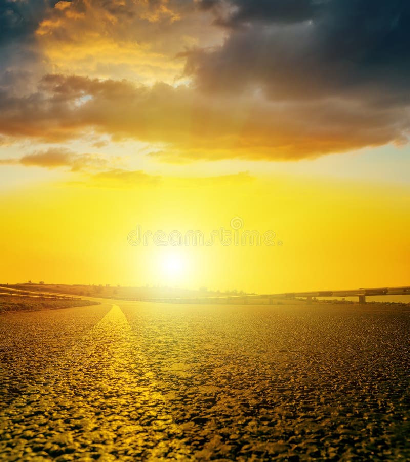 Asphalt Road To Horizon and Sunset in Clouds Stock Image - Image of ...
