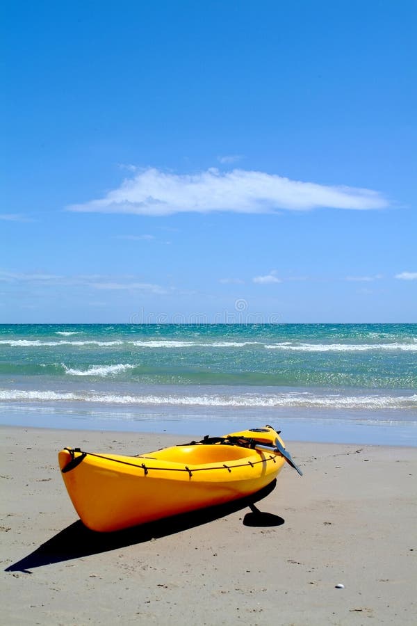 Yellow surf rescue canoe stock image. Image of surf, water - 6834203