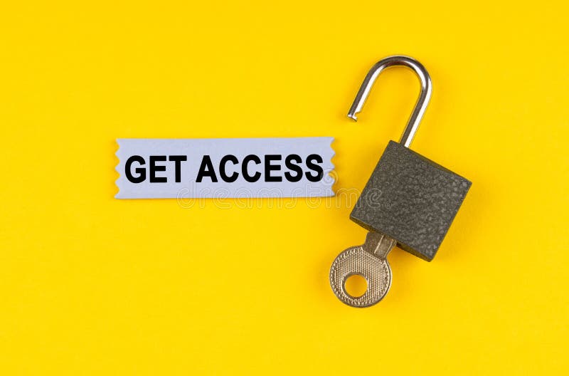 On the Yellow Surface Lies an Open Lock with a Key, Next To it is a ...