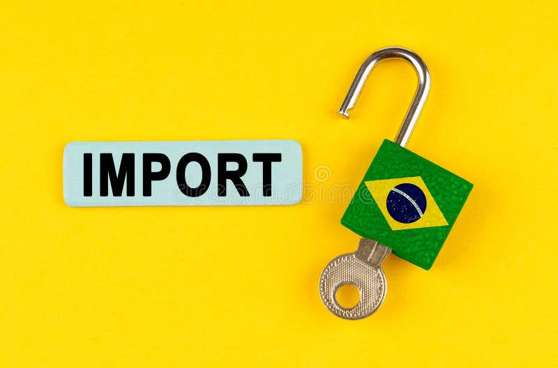 On the Yellow Surface is an Open Lock with a Key and a Sticker with the ...