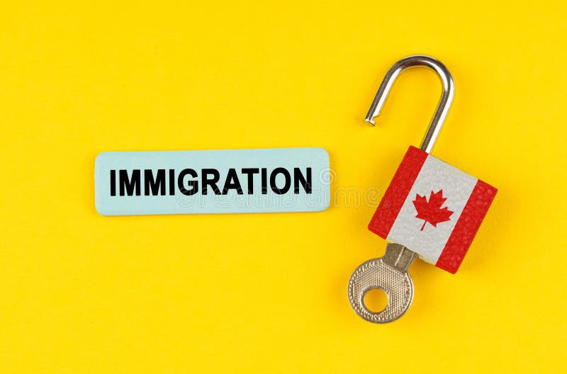 On the Yellow Surface is an Open Lock with a Key and a Sticker with the ...