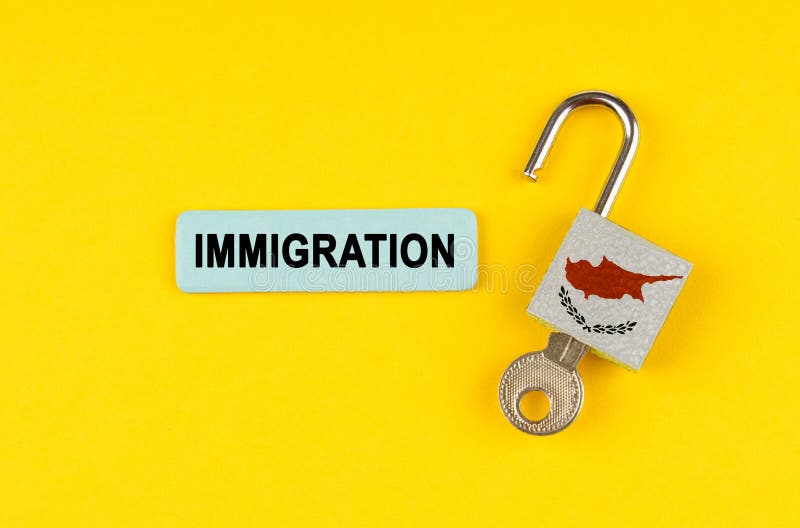 On the Yellow Surface is an Open Lock with a Key and a Sticker with the ...