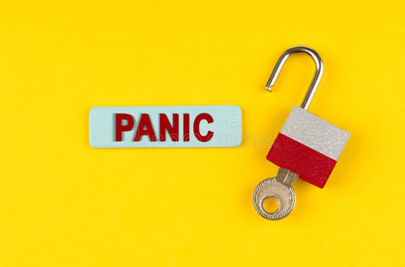 On the Yellow Surface is an Open Lock with a Key and a Sticker with the ...