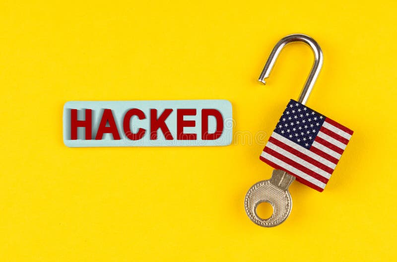 On the Yellow Surface is an Open Lock with a Key and a Sticker with the ...