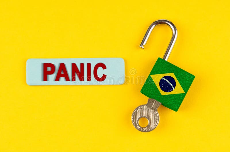 On the Yellow Surface is an Open Lock with a Key and a Sticker with the ...