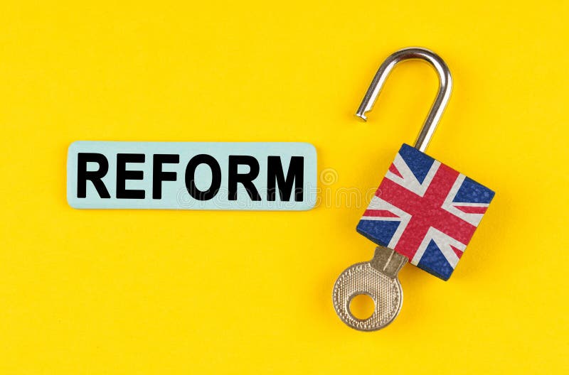 On the Yellow Surface is an Open Lock with a Key and a Sticker with the ...