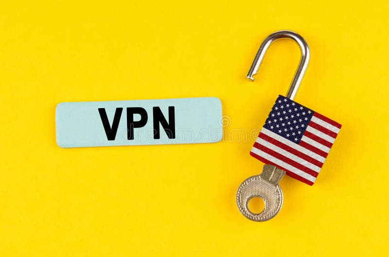 On the Yellow Surface is an Open Lock with a Key and a Sticker with the ...