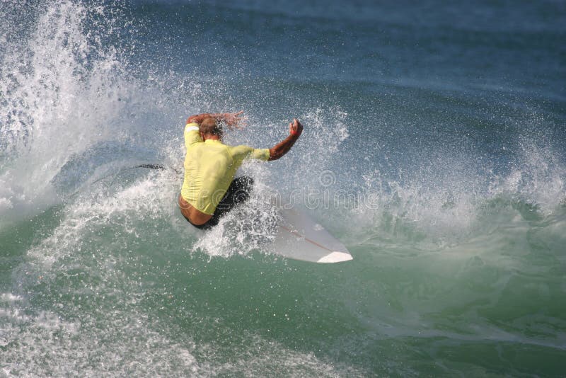 Surfer 11 editorial image. Image of action, active, yellow - 34735
