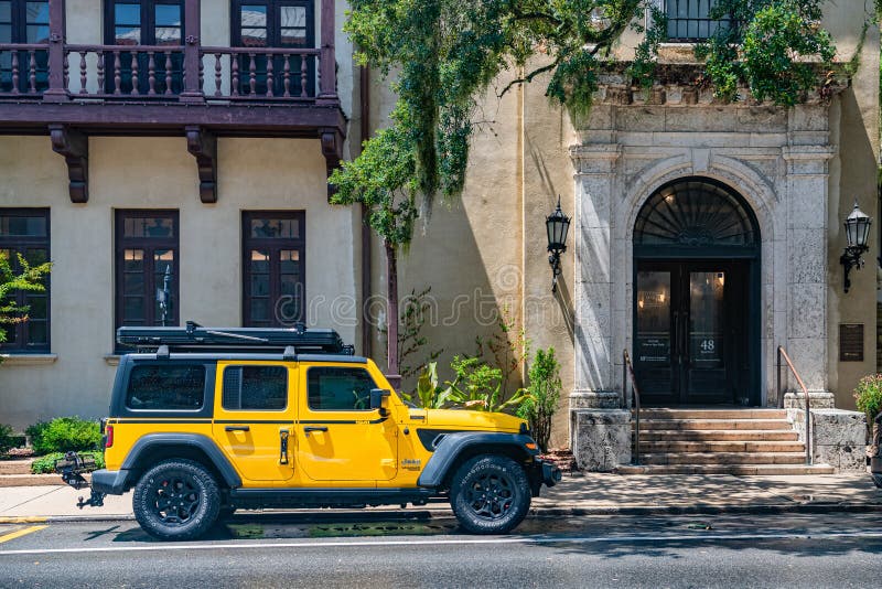 Yellow SUV Jeep is Parked at the Side of the Road Editorial Photography ...