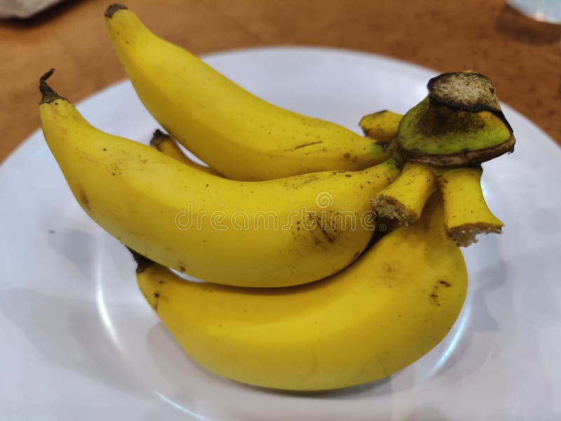 Yellow Sweet Bananas on a Plate Stock Photo - Image of orange ...