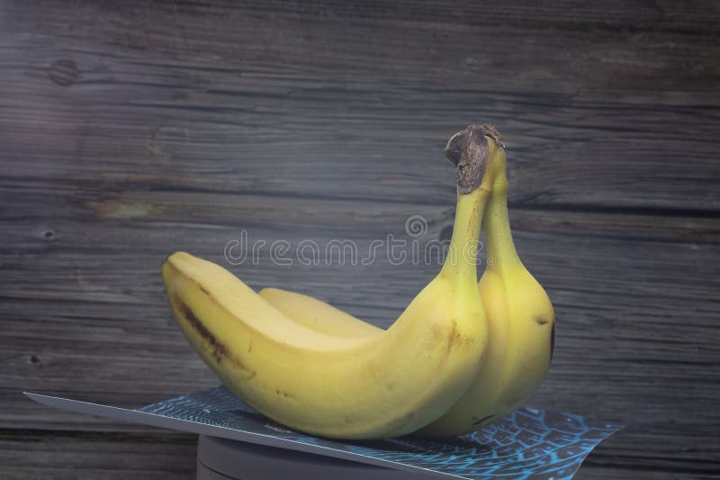 Yellow Sweet Bananas on Table Stock Photo - Image of curved, yummy ...
