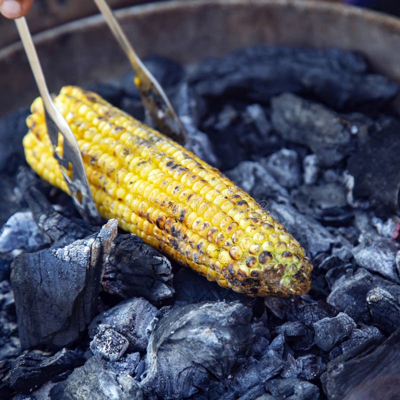 Yellow Sweet Corn Roasted on Fire from Black Carbons Stock Photo ...