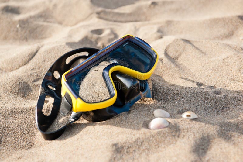 Yellow Swimming Mask on Sea Beach Stock Photo - Image of remote, object ...