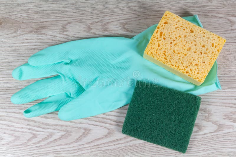 Yellow Synthetic Sponge, Scrub Pad and Rubber Glove Stock Photo - Image ...
