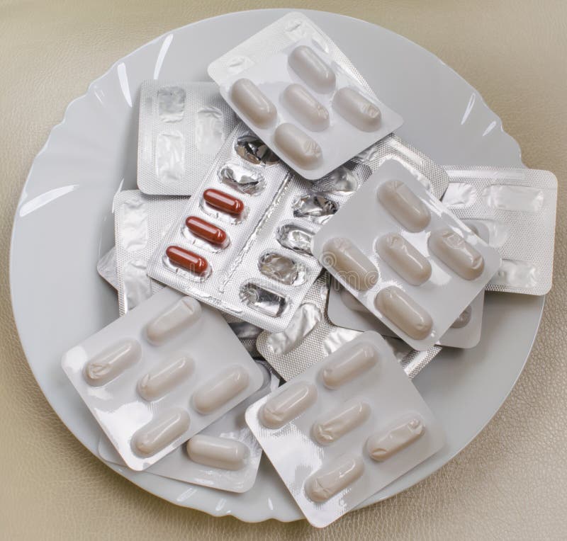 Yellow tablet of fish oil stock image. Image of illness - 56447363