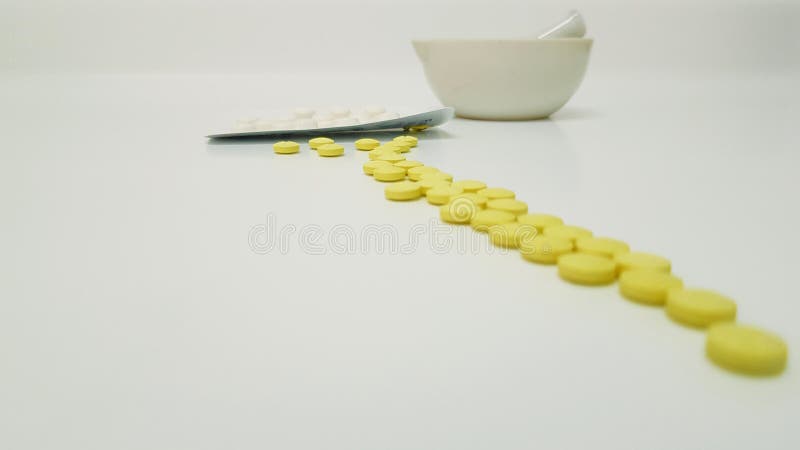 Yellow tablets compounding stock image. Image of medical - 125352021