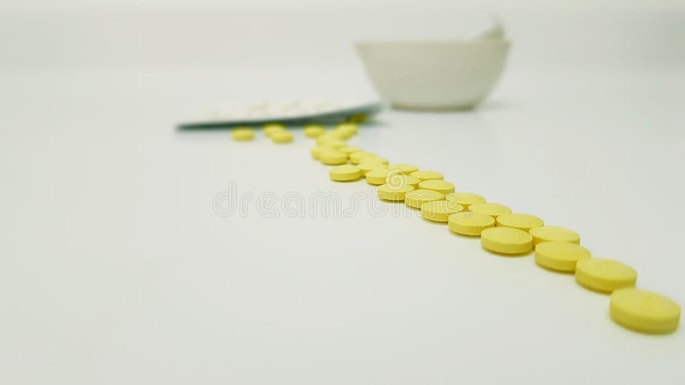 Yellow tablets compounding stock image. Image of laboratory - 125352037