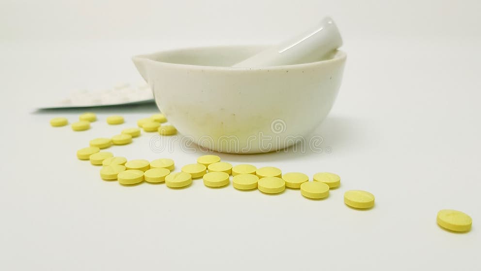 Yellow tablets compounding stock photo. Image of medical - 125352040