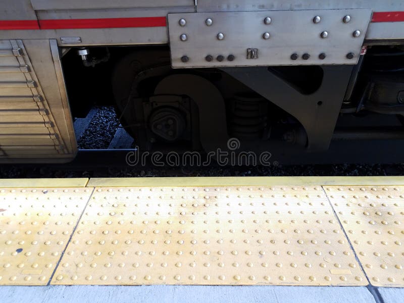 Yellow Tactile Bumps and Train and Stay Behind Yellow Line Sign Stock ...