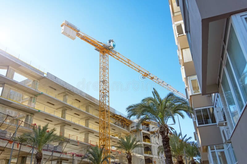 Yellow Tall Crane, Concrete Frame of Tall Apartment Building Under ...