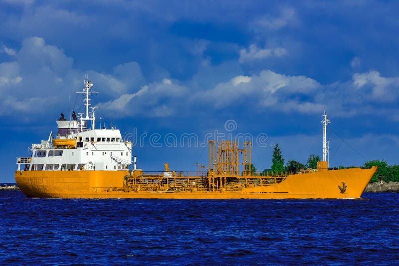 Yellow tanker ship stock image. Image of cloudy, blue - 112304497