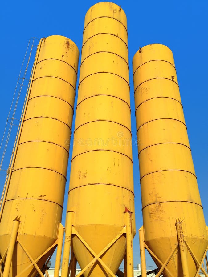 Yellow tanks stock photo. Image of fluid, concrete, architecture - 31691108