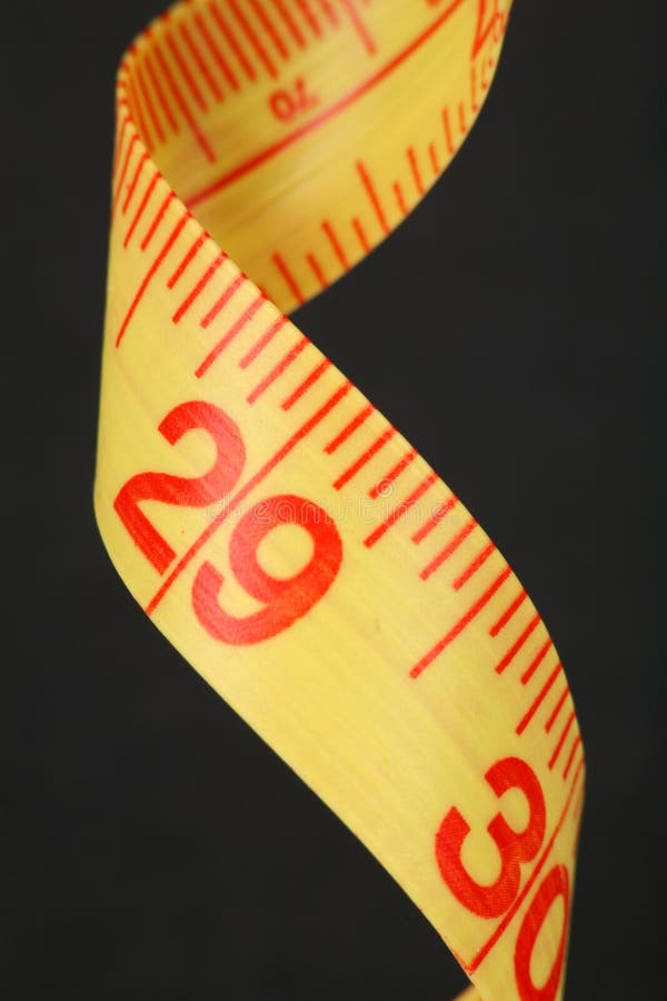 Yellow measuring tape stock photo. Image of number, feet - 1419474