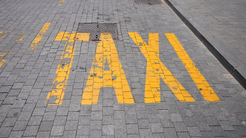 Yellow Taxi Station Marking on a Road Pavement Stock Image - Image of ...
