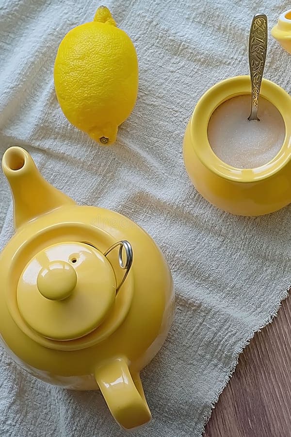 Yellow Teapot with Lemon and Sugar on the Table, Making Tea Stock Image ...