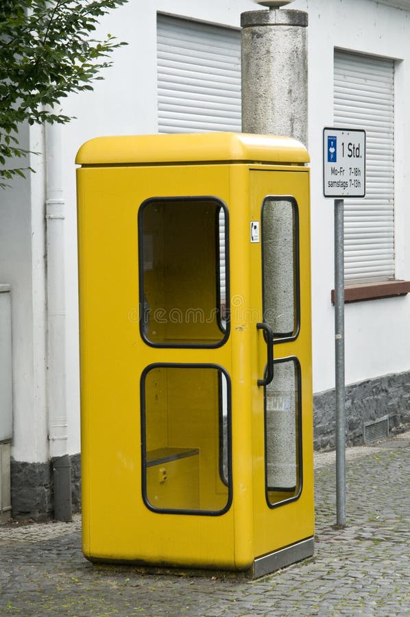 Yellow telephone booth stock photo. Image of gothic, bavarian - 6063036