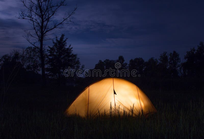 Yellow Tent Lighting at Night in Wildness Stock Photo - Image of space ...